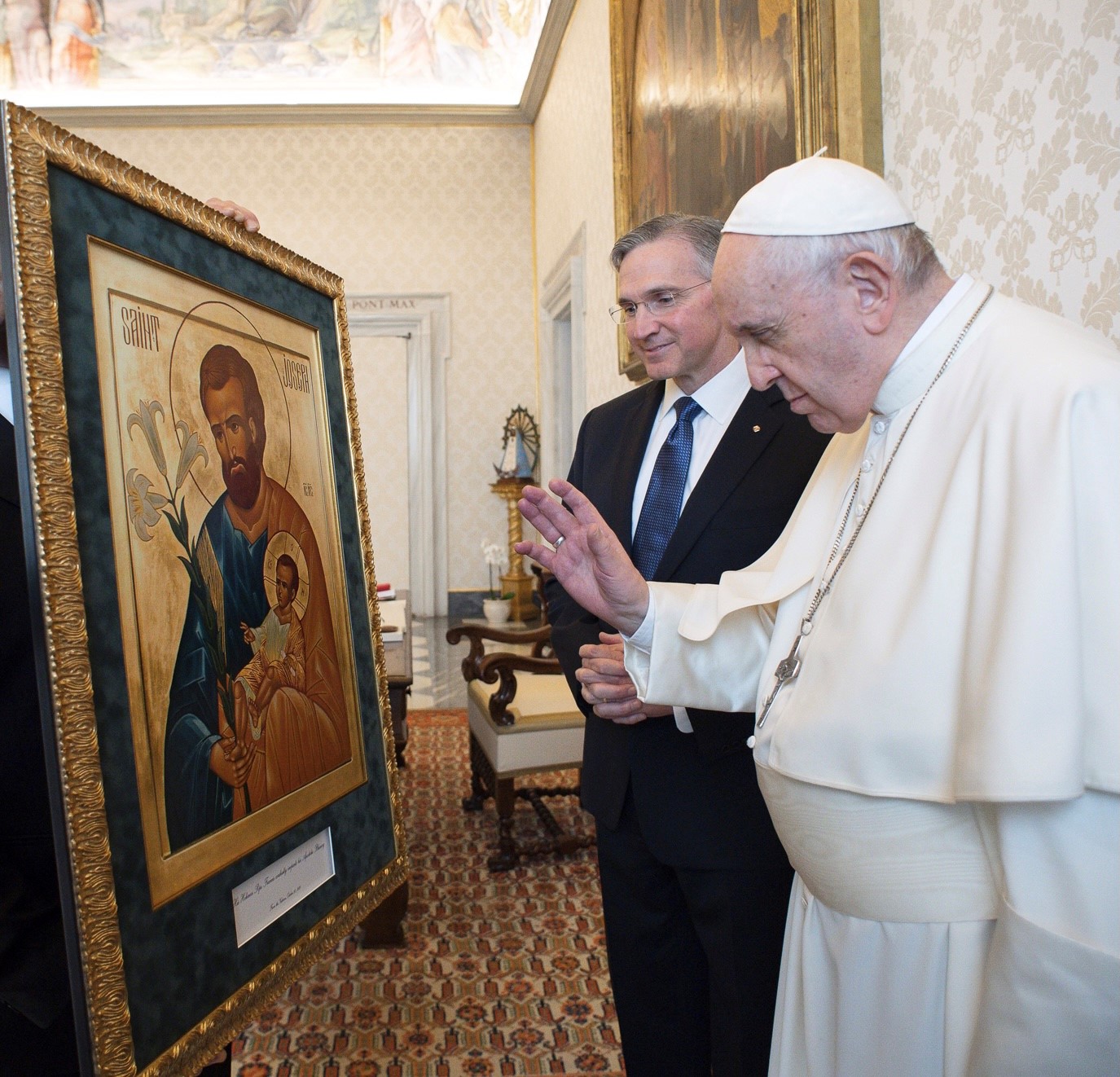 Pope Francis blesses a St. Joseph pilgrim icon that was presented by ...